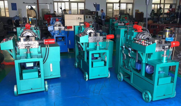 Automatic rebar threading machine